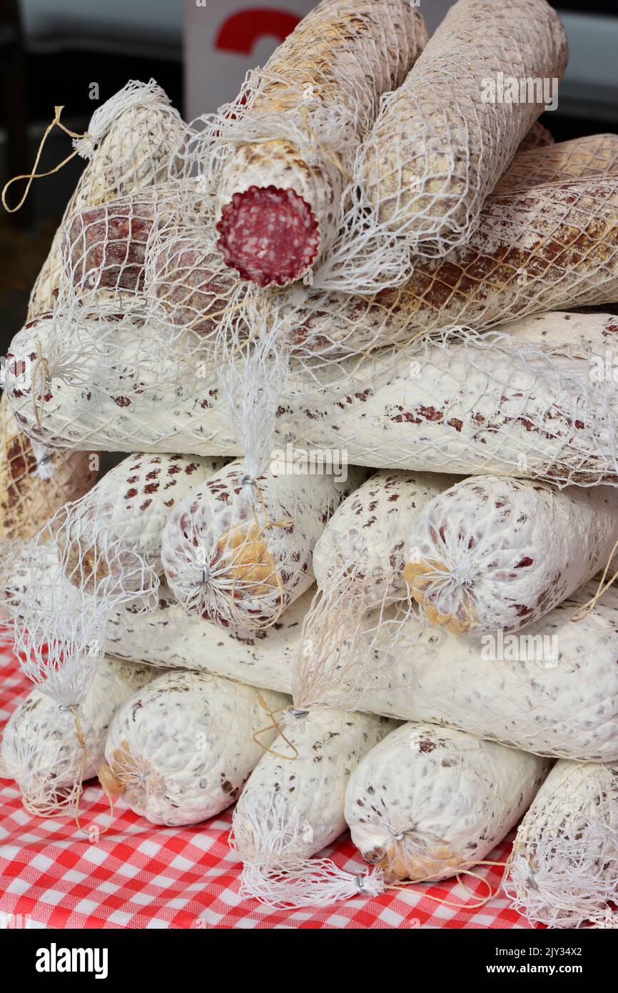 dried sausage salami in a white packaging Stock Photo - Alamy