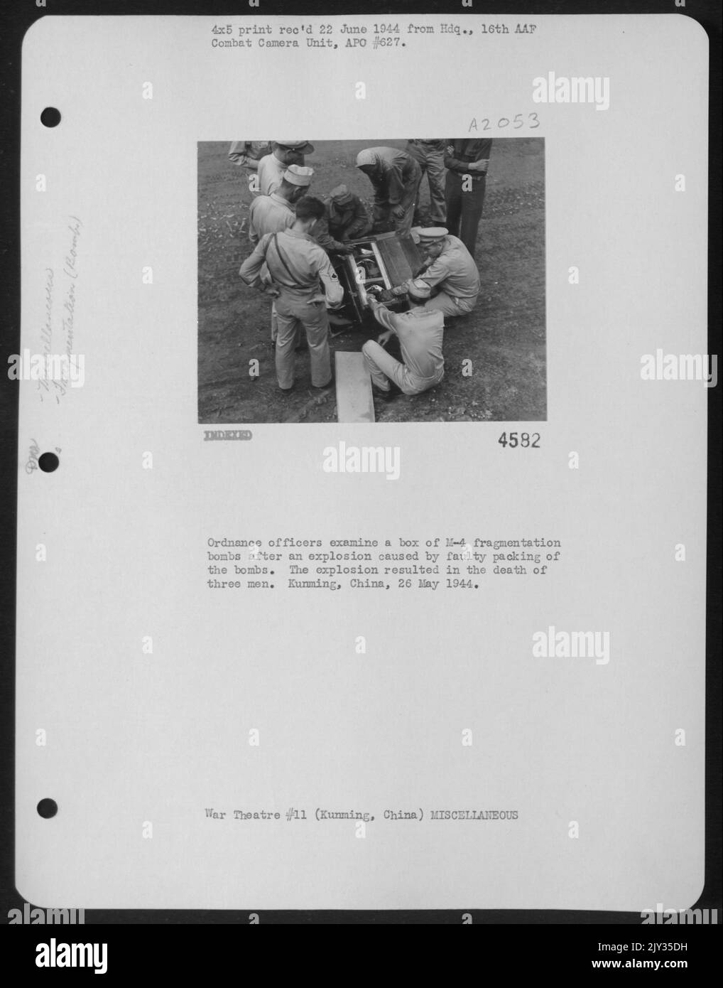 Ordnance Men Examine A Box Of M-4 Fragmentation Bombs After An ...