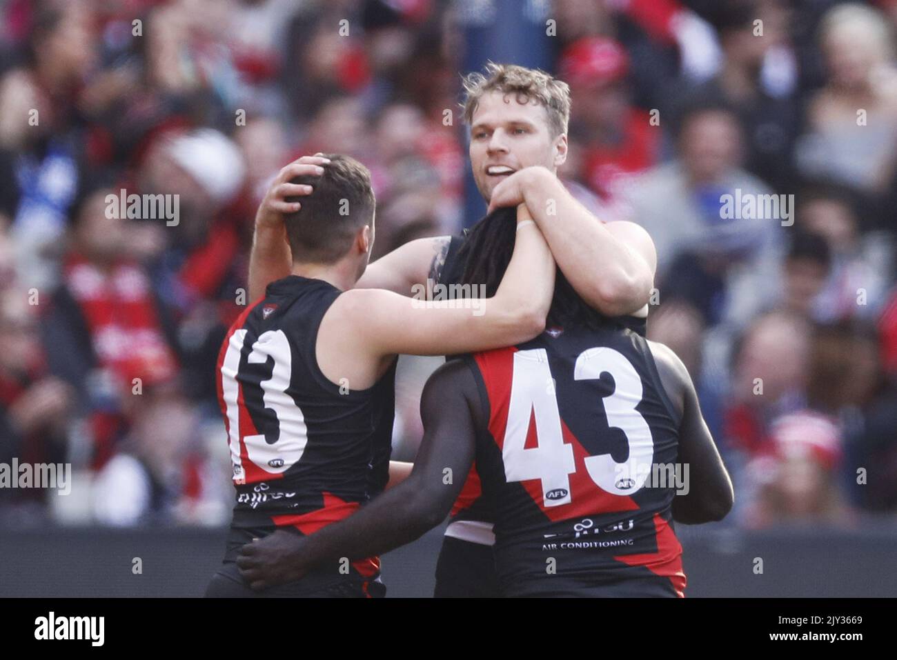 Jake Stringer of the Bombers (top) celebrates an Anthony McDonald ...