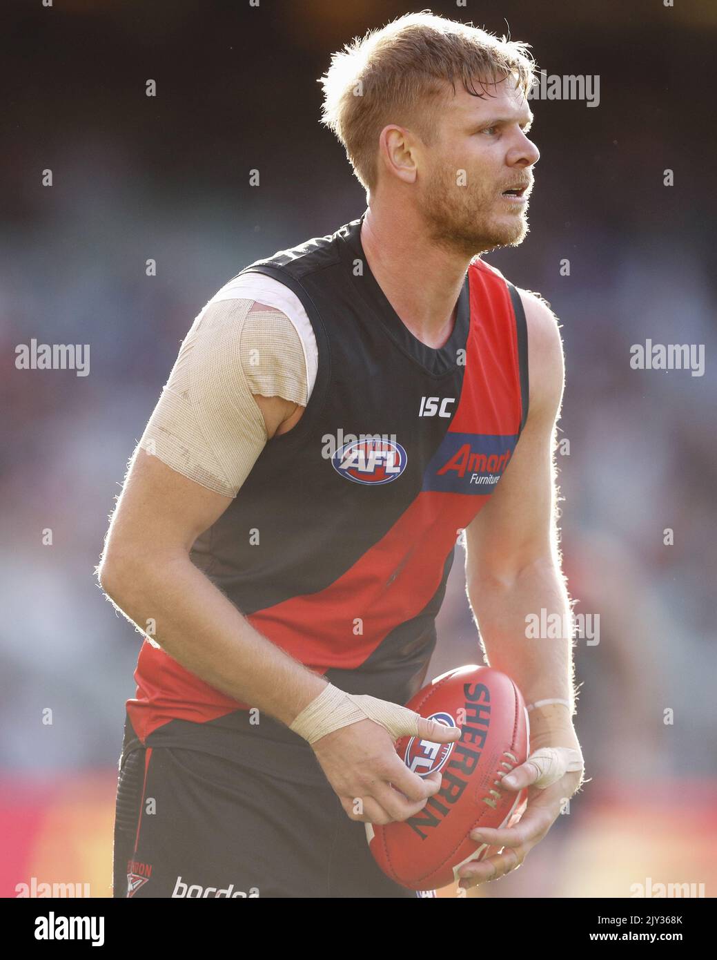 Michael Hurley of the Bombers looks upfield during the Round 16 AFL ...