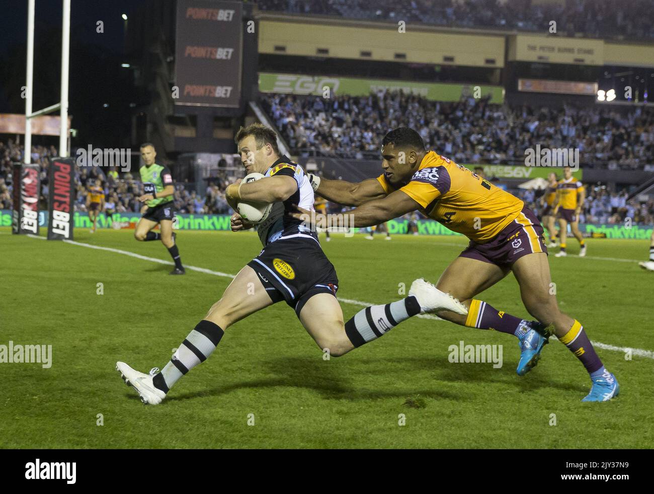 Josh Morris of the Sharks scores during the Round 16 NRL match between ...