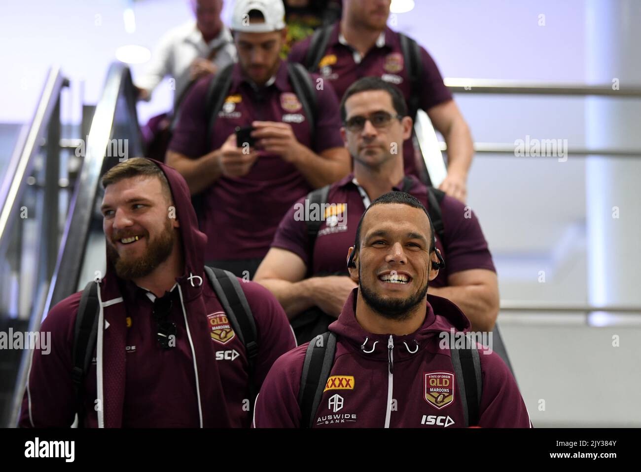 Queensland Maroons player Will Chambers (right) arrives at Sydney ...