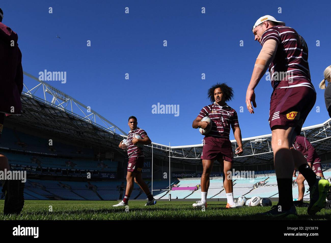 Queensland's Maroons' Felise Kaufusi (centre) joins his team mates at ...