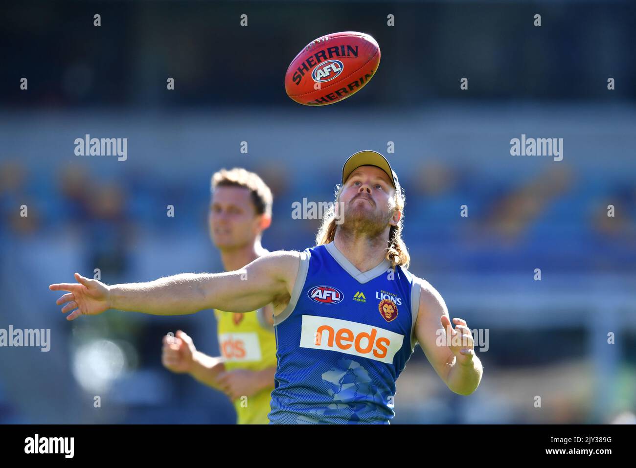 Daniel Rich (right) is seen during Brisbane Lions training at the Gabba ...