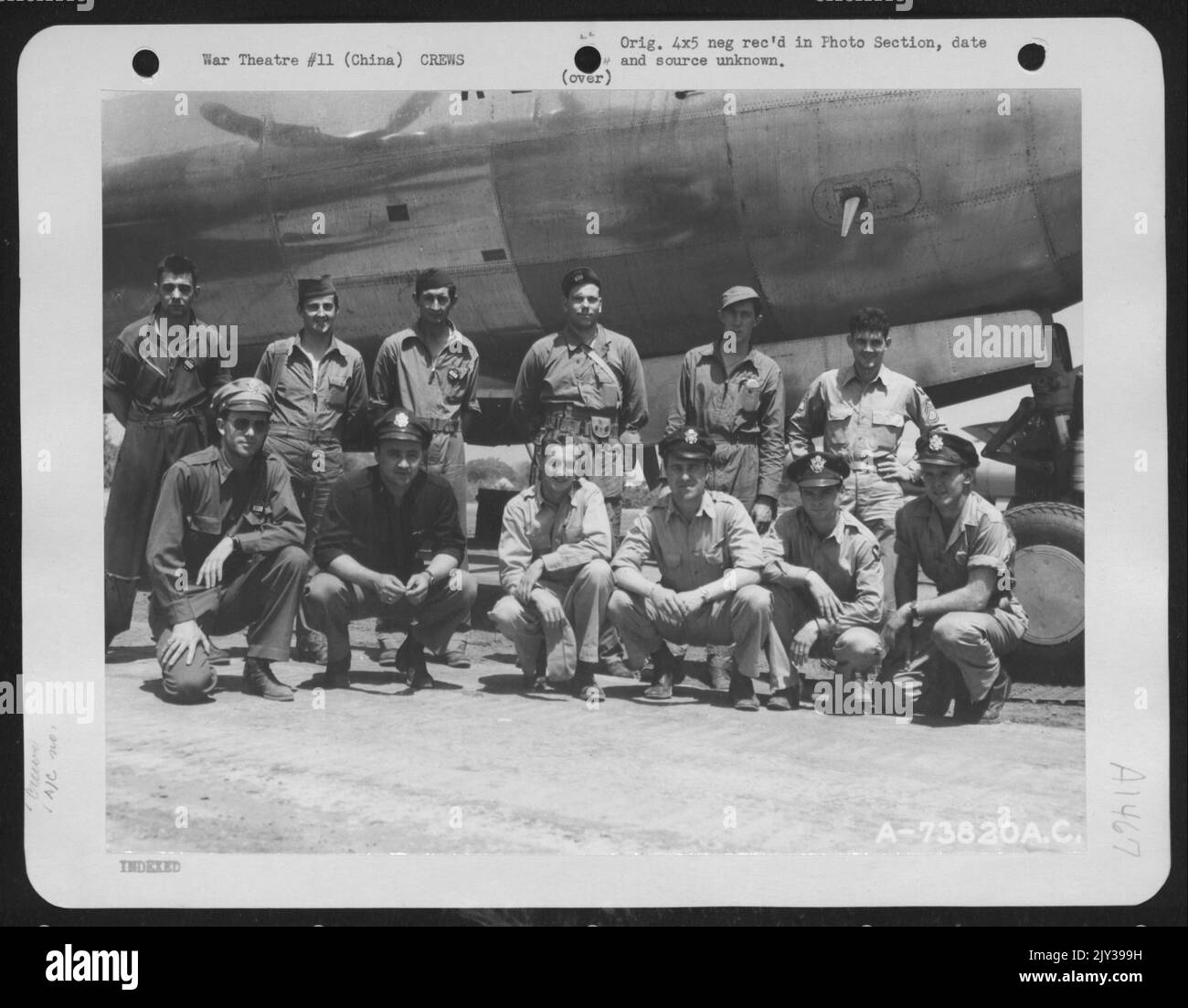 Crew Of Boeing B-29 (A/C 42-6306) Pose Beside Their Plane At An Air ...