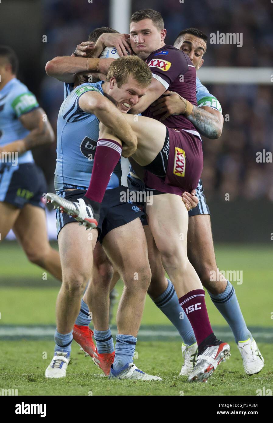 Corey Oates of the Maroons is tackled during Game 3 of the 2019 State ...