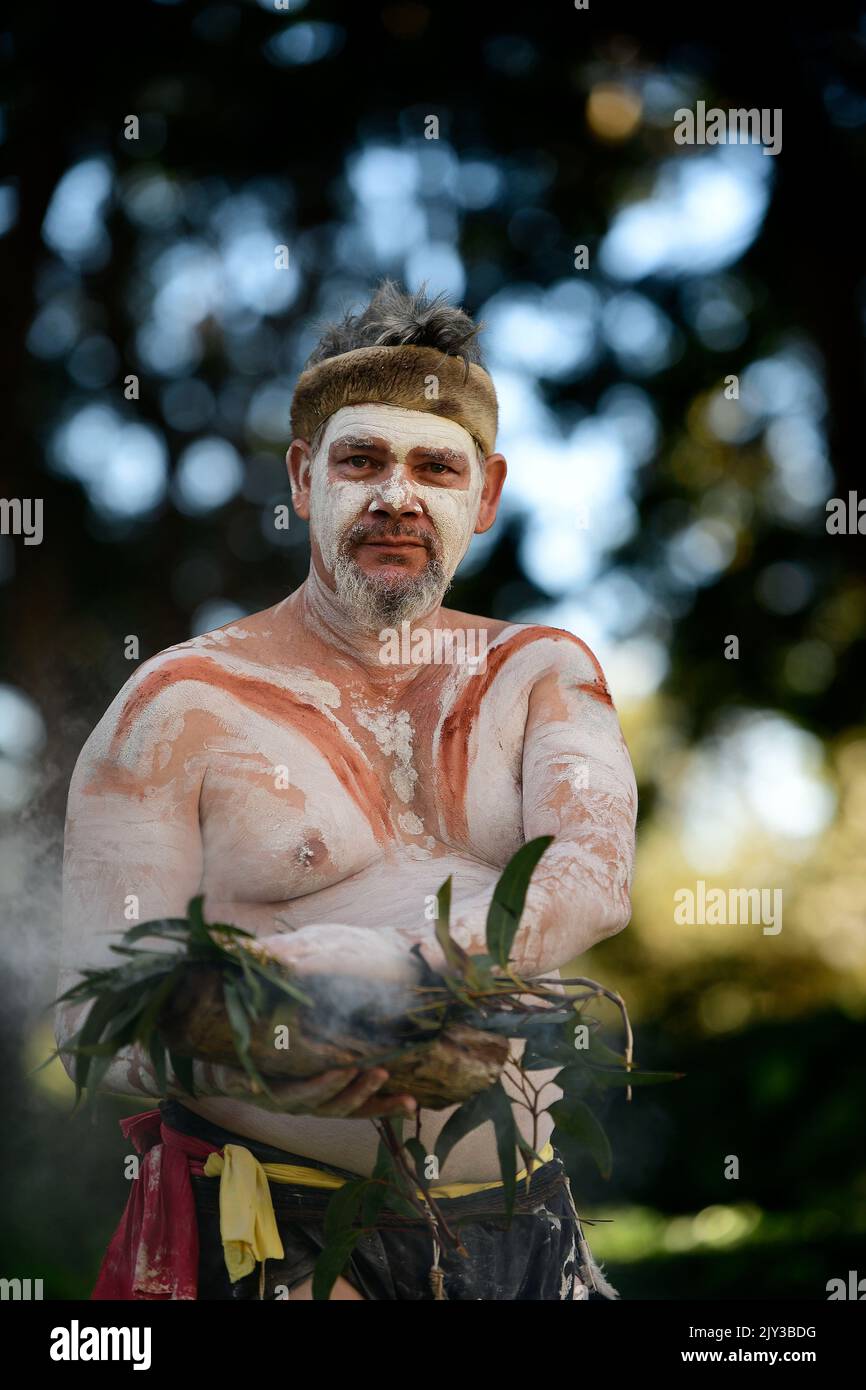 Matthew Doyle carries out a roaming smoking ceremony during The City of ...