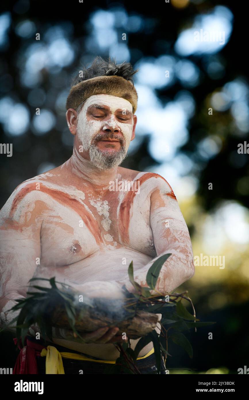 Matthew Doyle carries out a roaming smoking ceremony during The City of ...