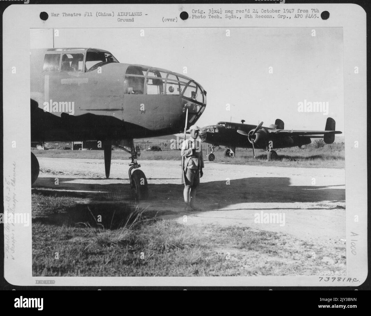 A Chinese Soldier Guards A North American B-25 At An Airfield Somewhere ...