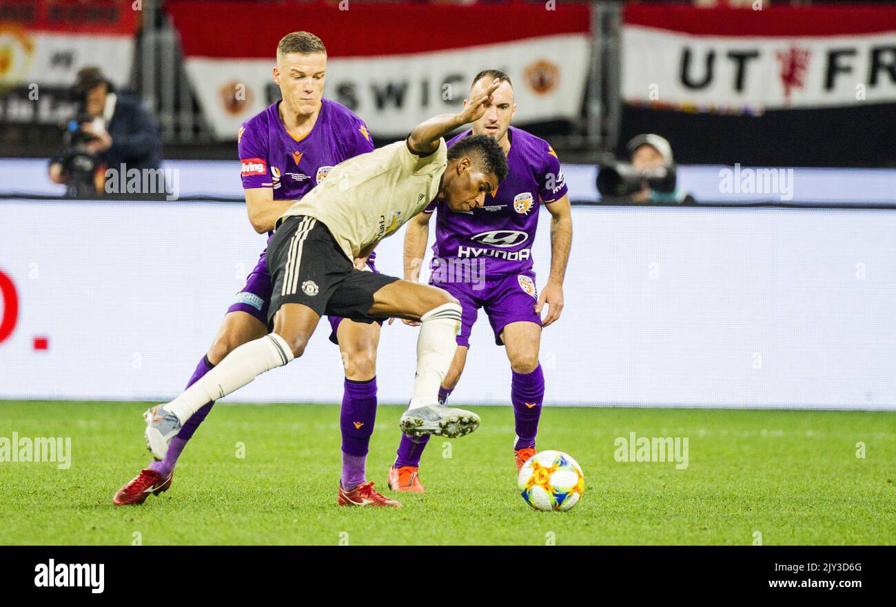 Shane Lowry of the Glory and Marcus Rashford of United during the Perth ...