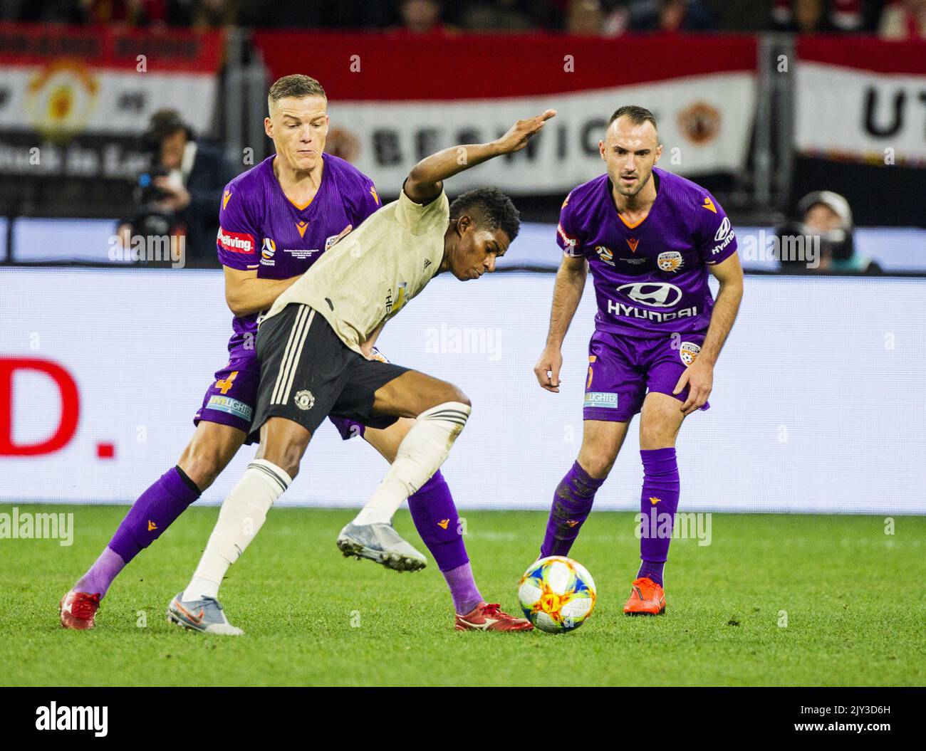 Shane Lowry of the Glory and Marcus Rashford of United during the Perth ...