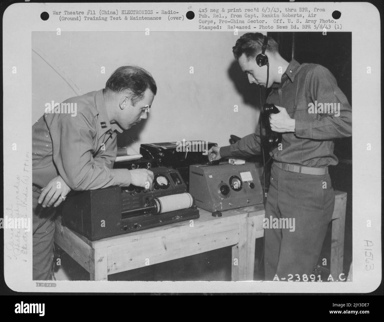 The Army Signal Corps uses Radio photo in China. Shown are Lt. Andrew ...