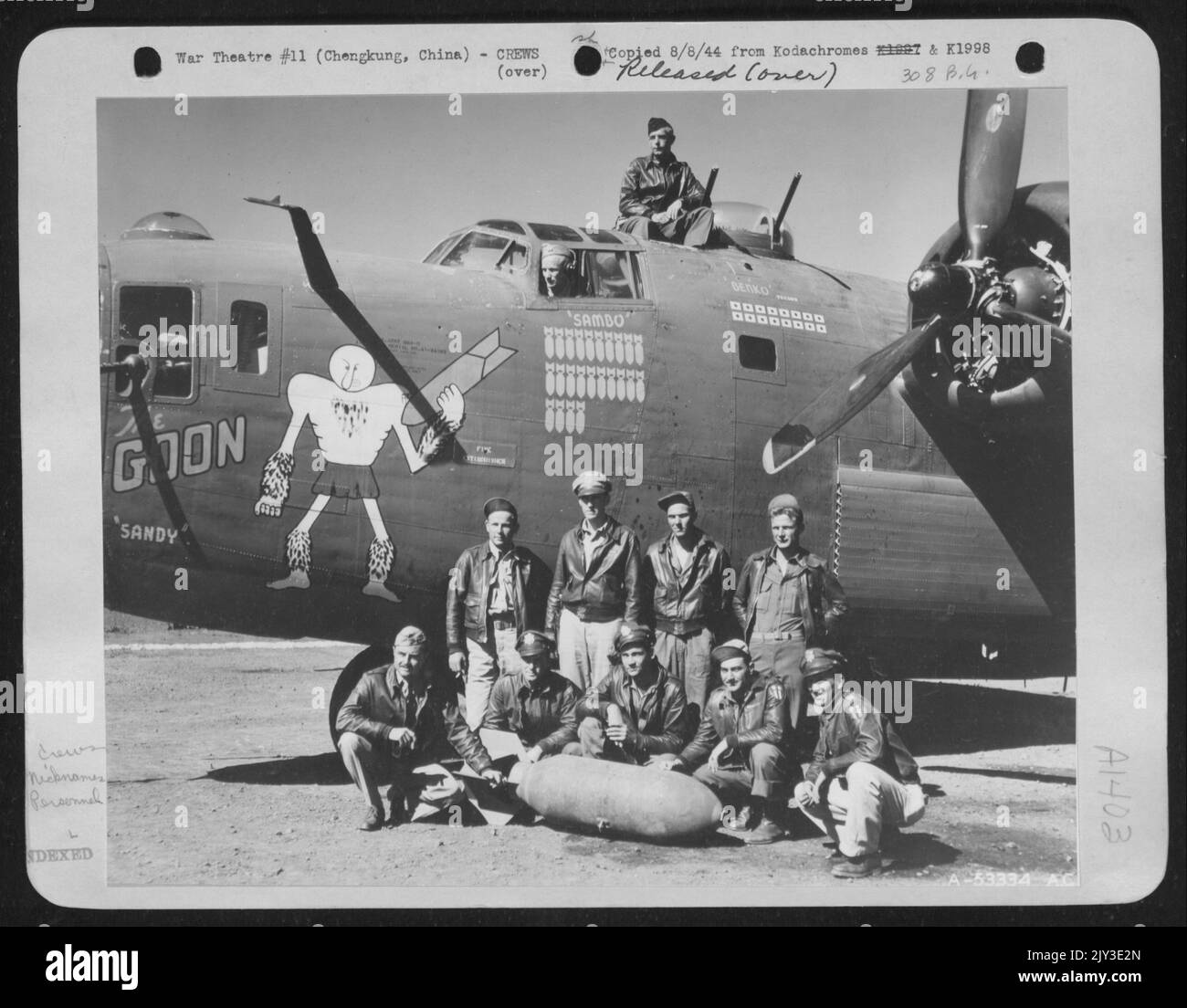 Crew of Consolidated B-24 Liberator "Goon". On top of plane is T/Sgt. Arthur J. Benko and in ...