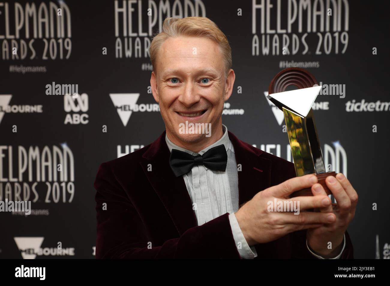 Michael Honeyman poses for a photograph with his award for Best Male ...