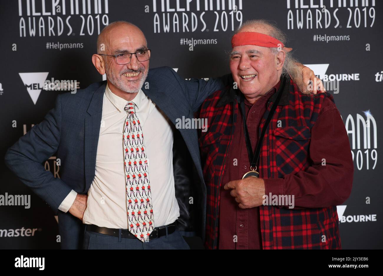 Paul Kelly and Kev Carmody, winner of the JC Williamson Award, pose for ...