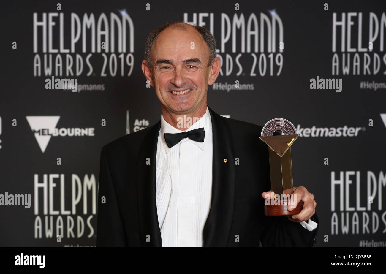 Ian Scobie poses for a photograph with his award for Best Opera at the ...