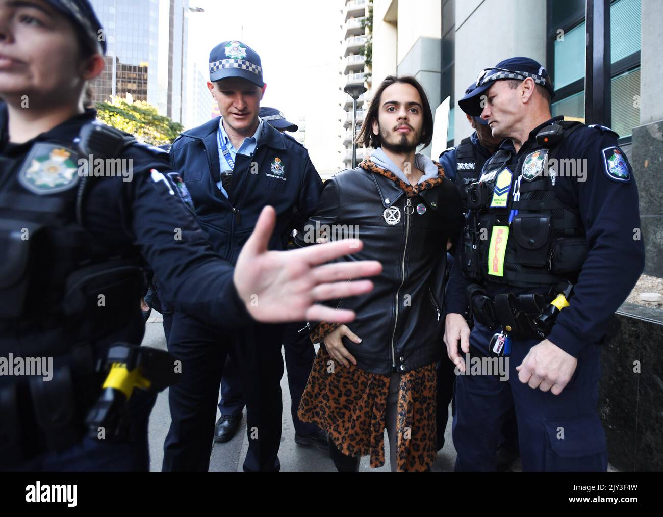 Environmental activist Eric Herbert is arrested during an Extinction ...