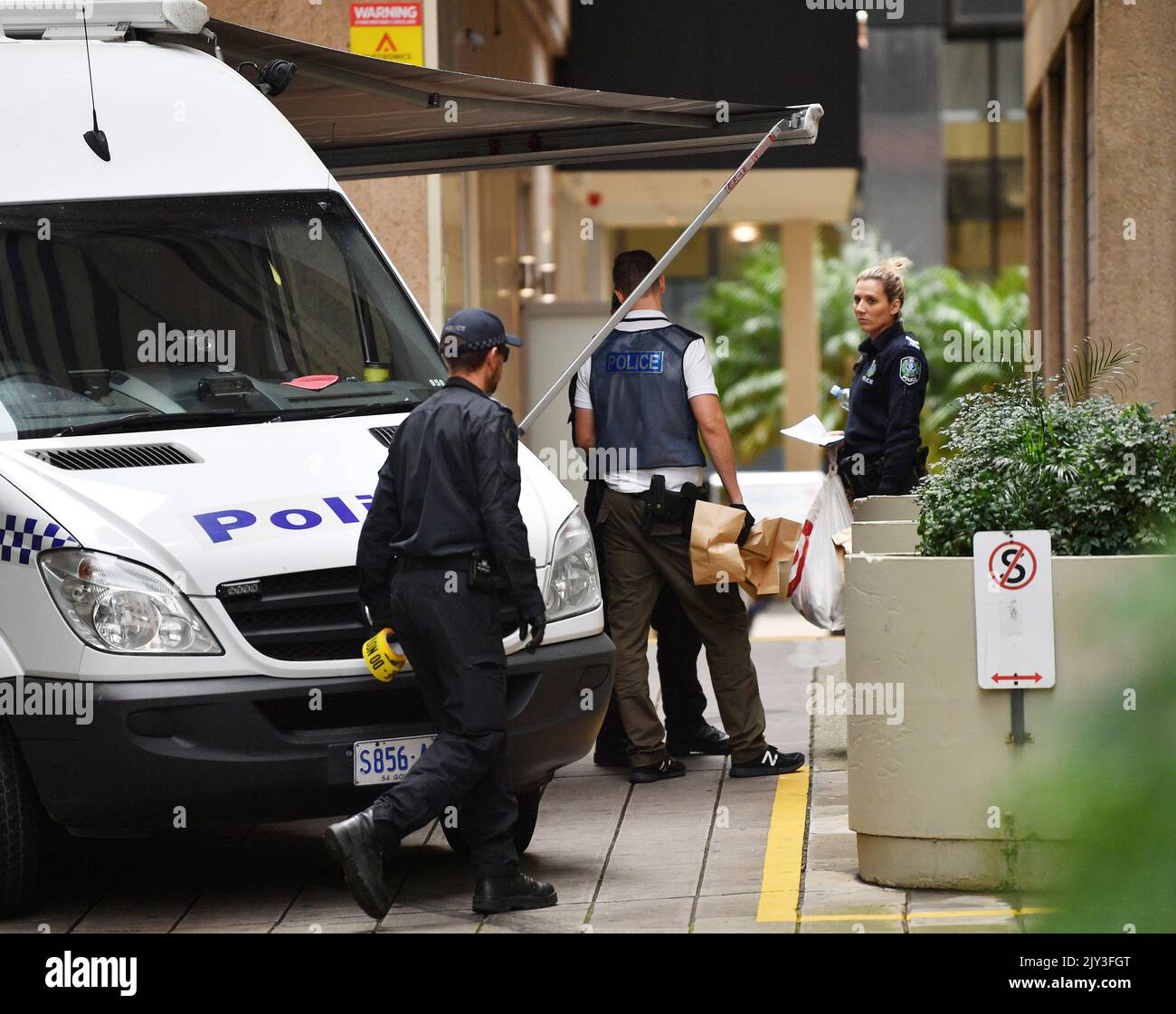 South Australian police officers are seen at a residential complex in ...