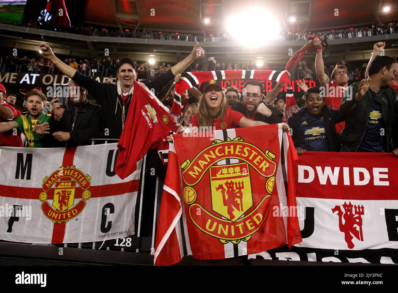 Manchester United fans cheer during the Manchester United and Leeds United football match at ...