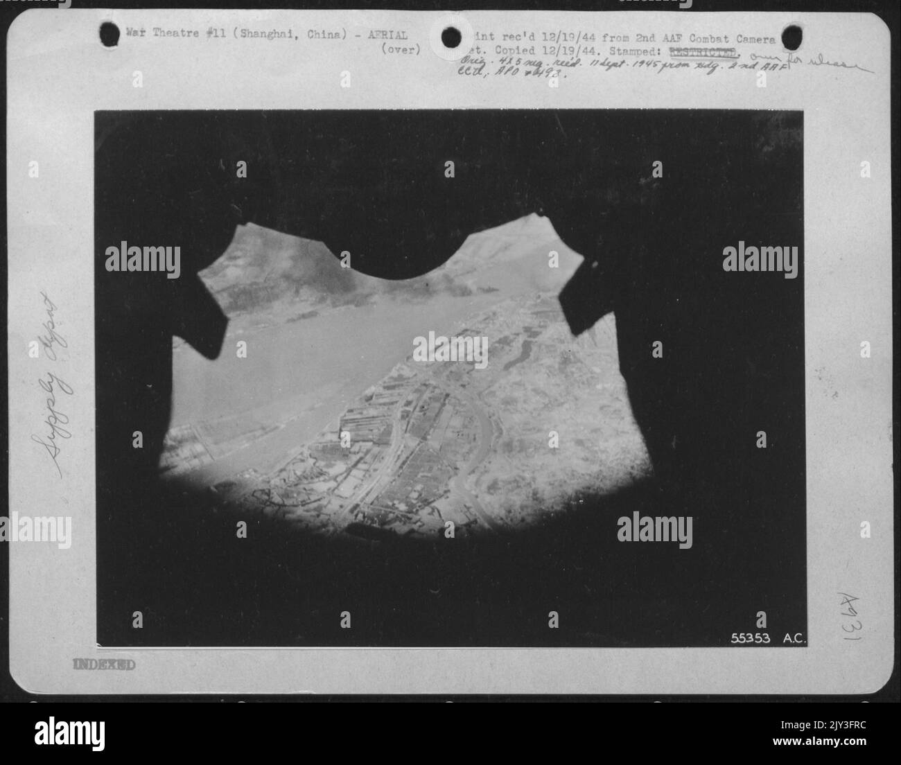 Approach to target at Shanghai, China, photographed through opened bomb ...