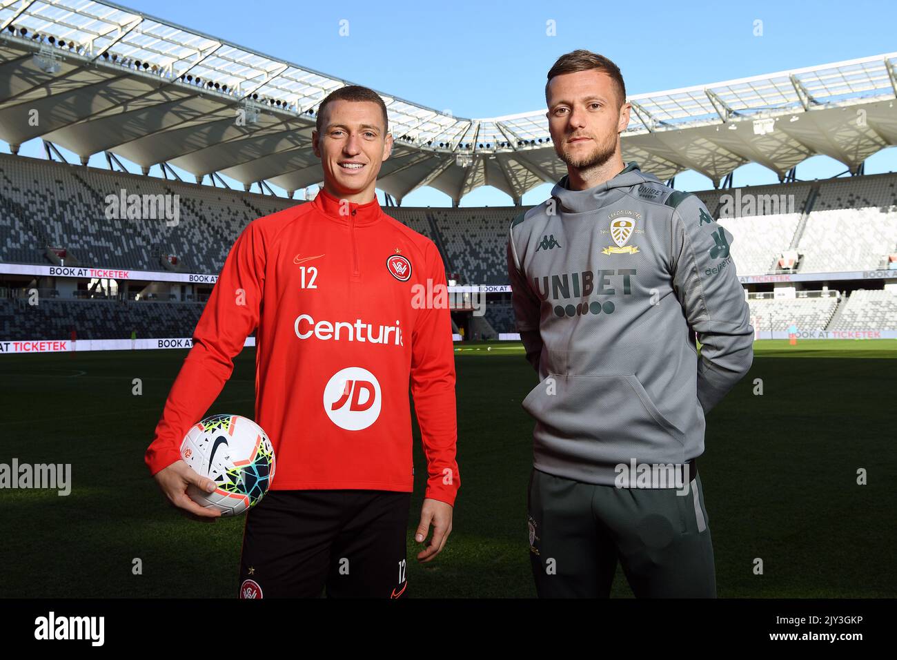 Western Sydney Wanderers captain Mitchell Duke (left) and Leeds United ...