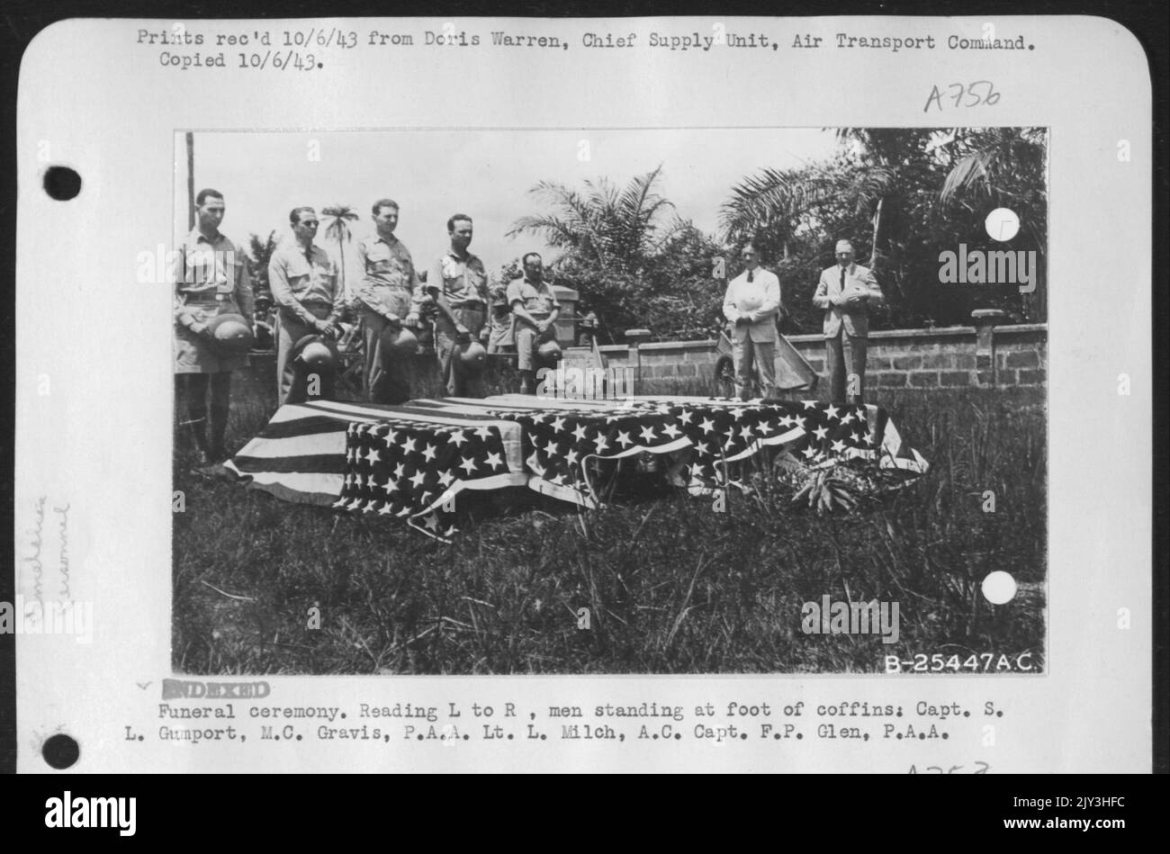 Funeral ceremony. Reading L to R, men standing at foot of coffins: Capt ...