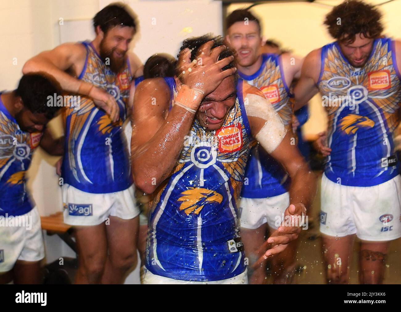 Francis Watson of the West Coast Eagles is doused with Gatorade to ...
