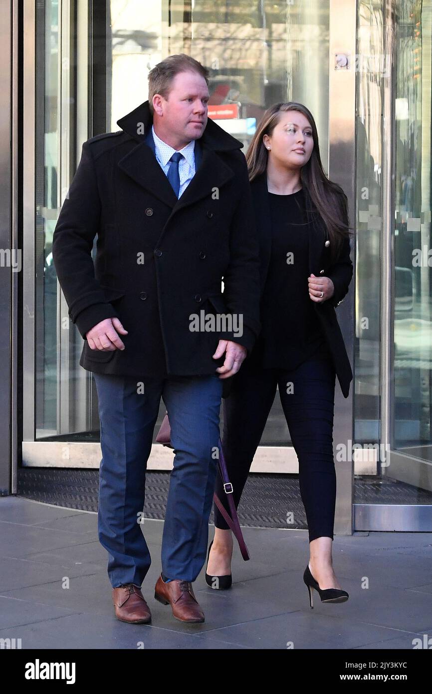 Nick Stevens (left) departs the County Court of Victoria in Melbourne ...