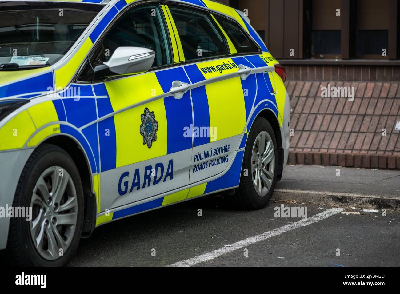 View of police emblems in Ireland, emblem on building, car police ...