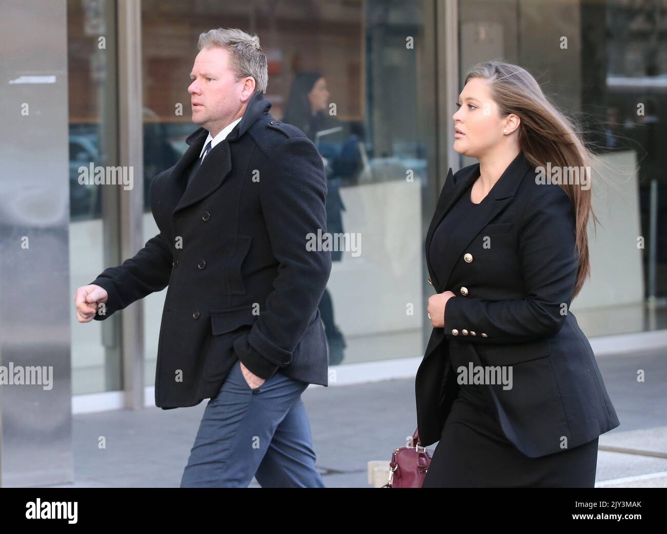Former AFL player Nick Stevens (left) arrives at the Melbourne County ...