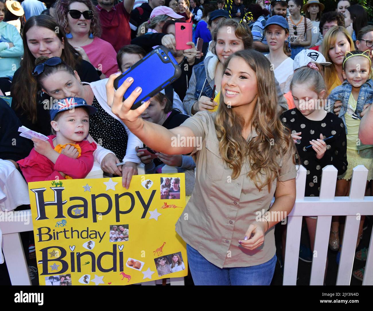 Bindi Irwin is seen taking selfie photos with fans at a celebration for ...
