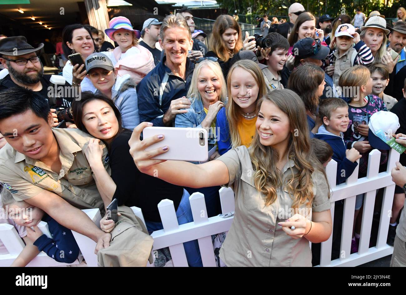 Bindi Irwin is seen taking selfie photos with fans at a celebration for ...