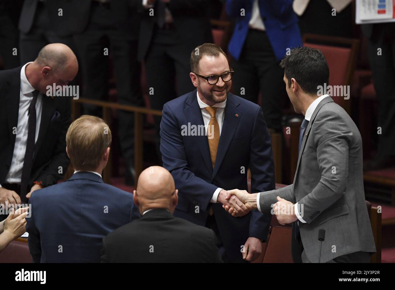 Liberal Senator for NSW Andrew Bragg is congratulated after delivering ...