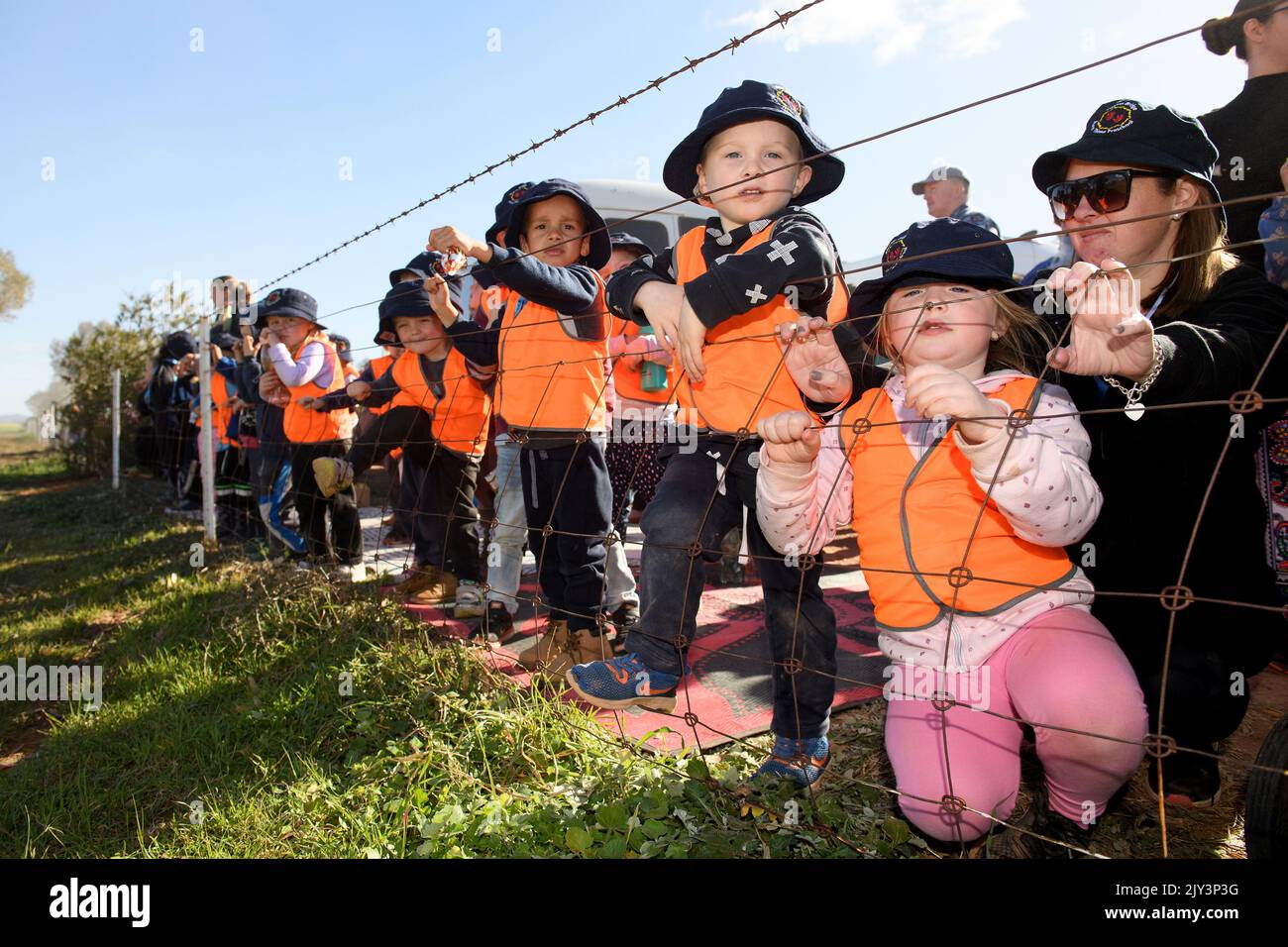 Local kids watch on as a Royal Australian Air Force C-130J Hercules ...