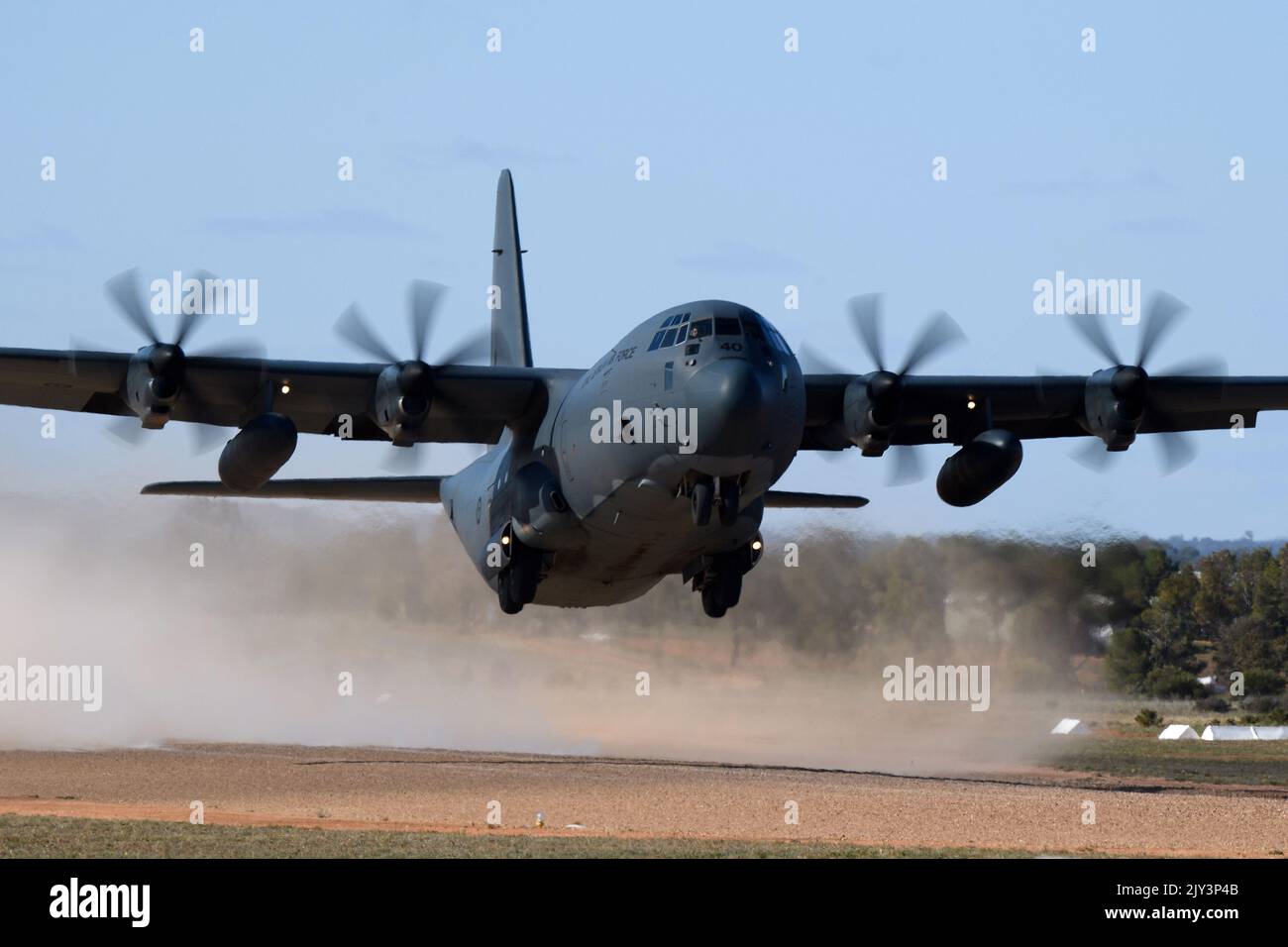 A Royal Australian Air Force C-130J Hercules aircraft takes off from ...
