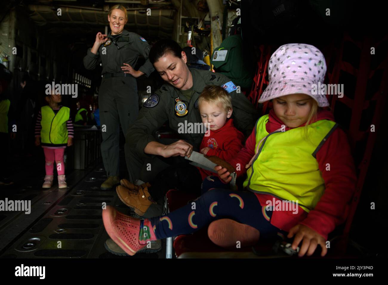 Alex Templeton and Lacey Munro are shown around a Royal Australian Air ...