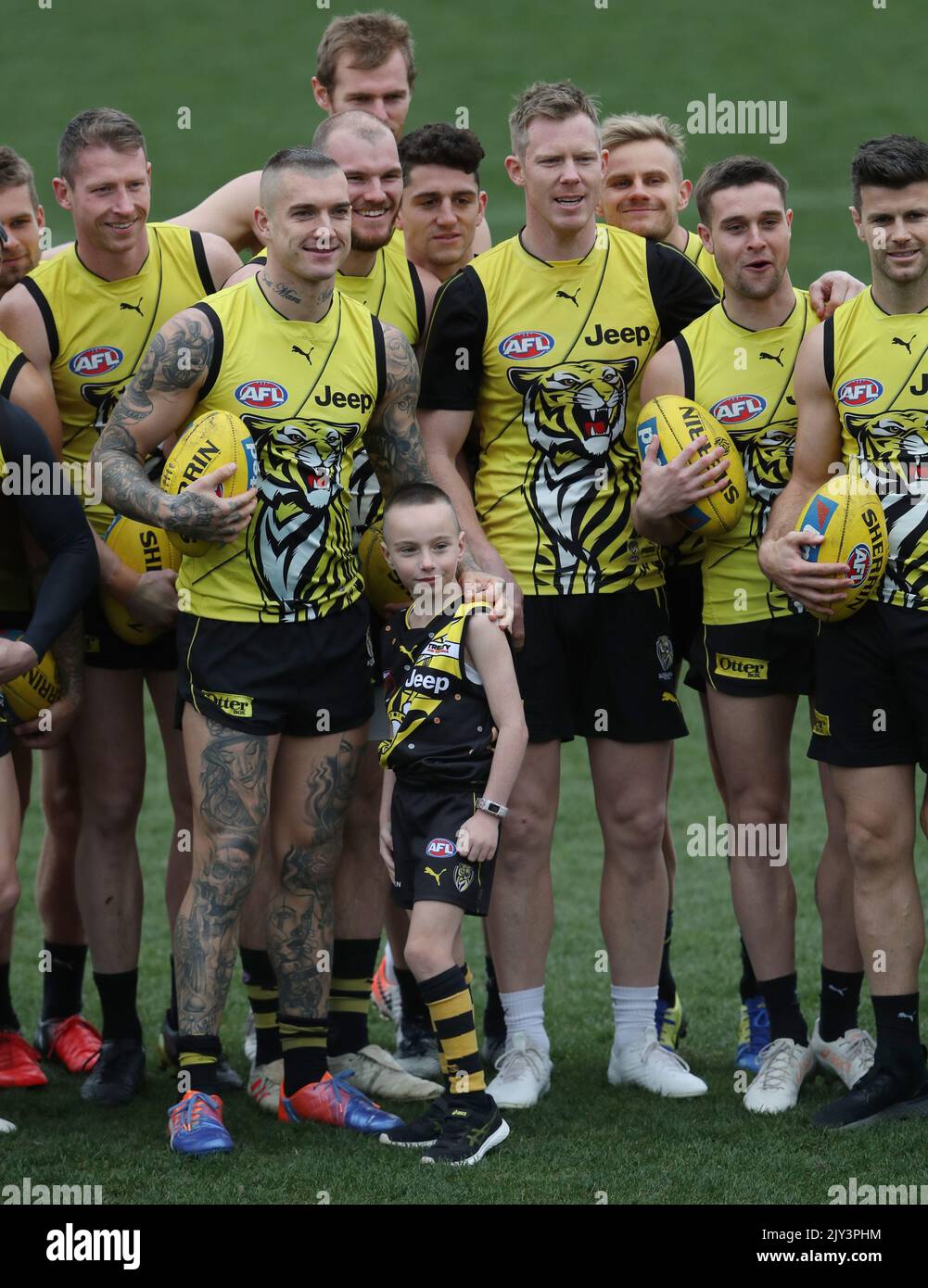 Dustin Martin with Ryder Reid, 8, during a Richmond Tigers training ...