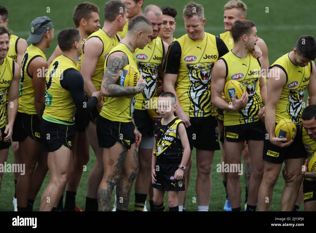 Dustin Martin with Ryder Reid, 8, during a Richmond Tigers training ...