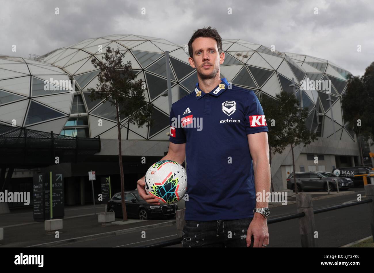 Melbourne Victory sign up Robbie Kruse poses for a photo after a press ...