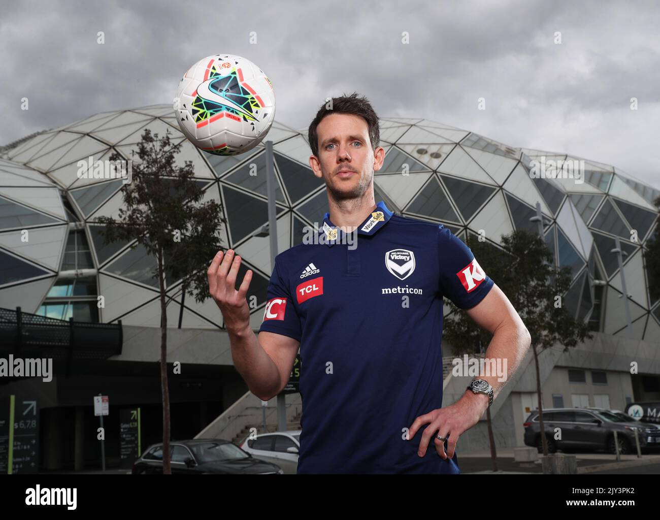 Melbourne Victory sign up Robbie Kruse poses for a photo after a press ...