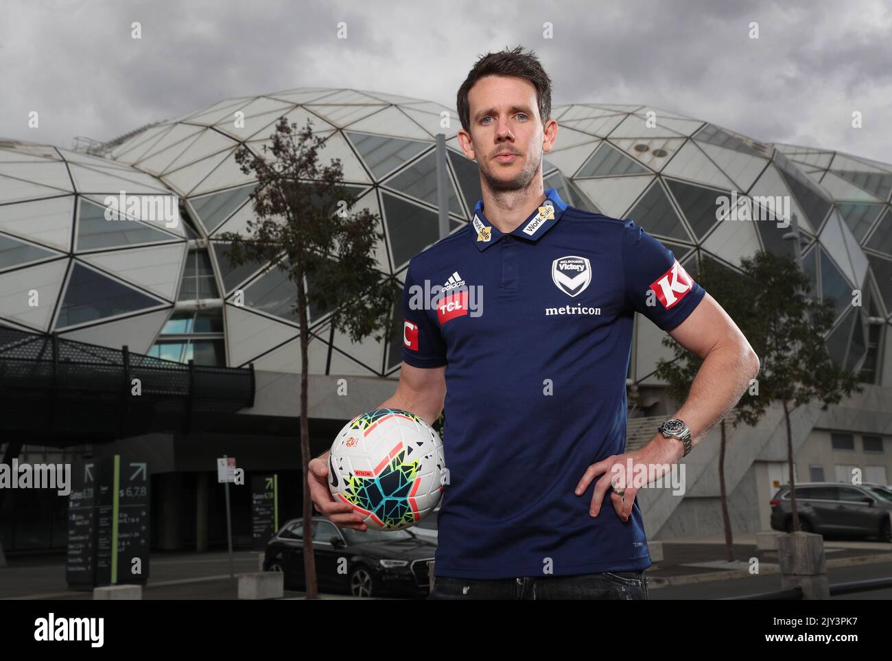 Melbourne Victory sign up Robbie Kruse poses for a photo after a press ...