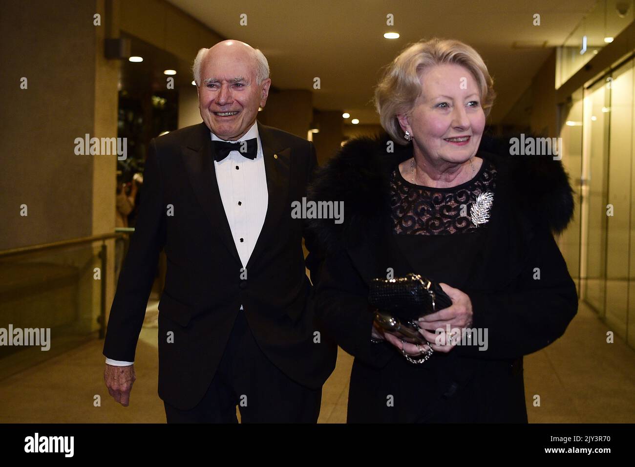 Former prime minister John Howard and wife Janette Howard arrive for ...