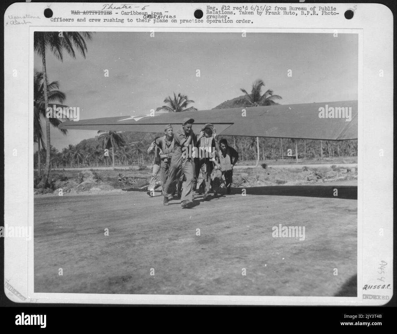 Officers and crew rushing to their plane on practice operation order ...