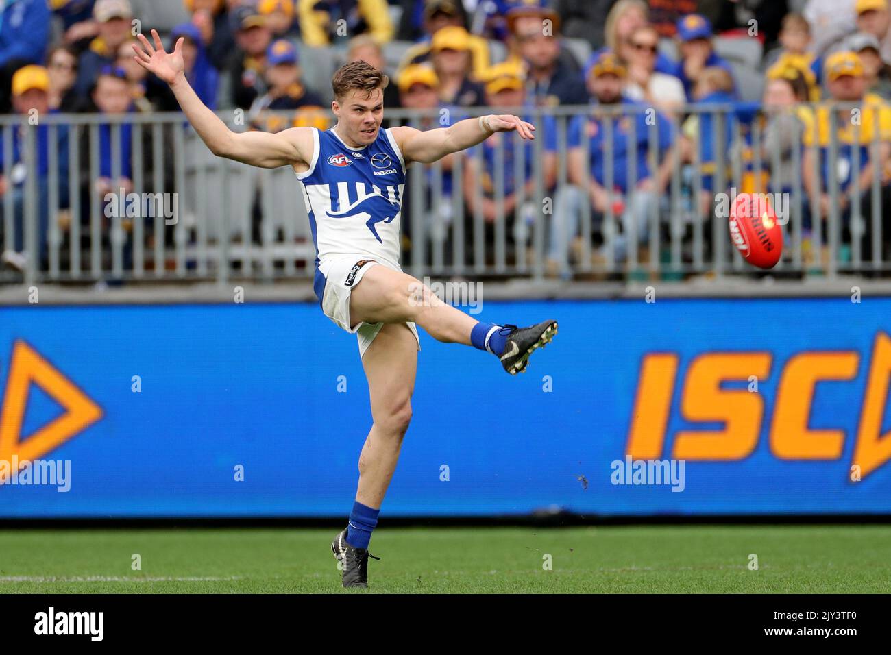Cameron Zurhaar of the Kangaroos kicks on goal during the Round 19 AFL ...