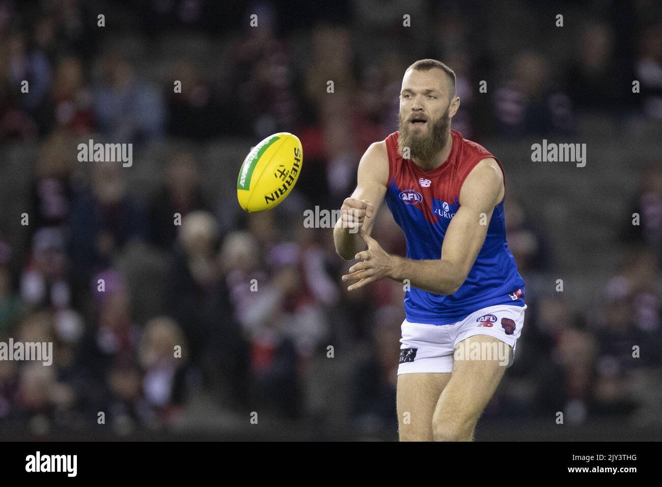 Max Gawn of the Demons handpasses the ball during the Round 19 AFL ...