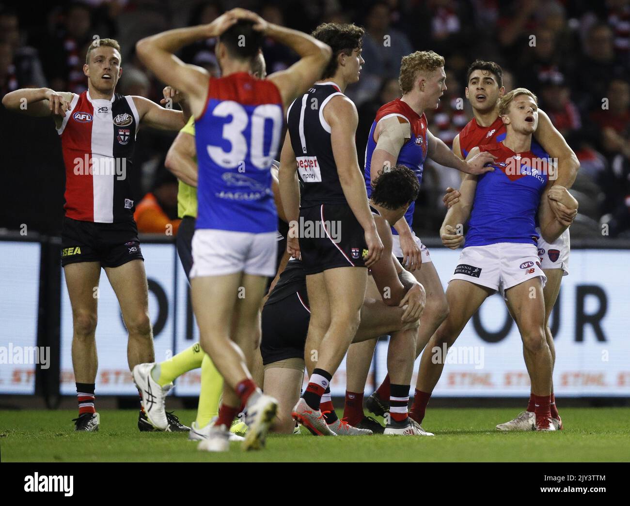 Corey Wagner of the Demons (right) celebrates a goal during the Round ...