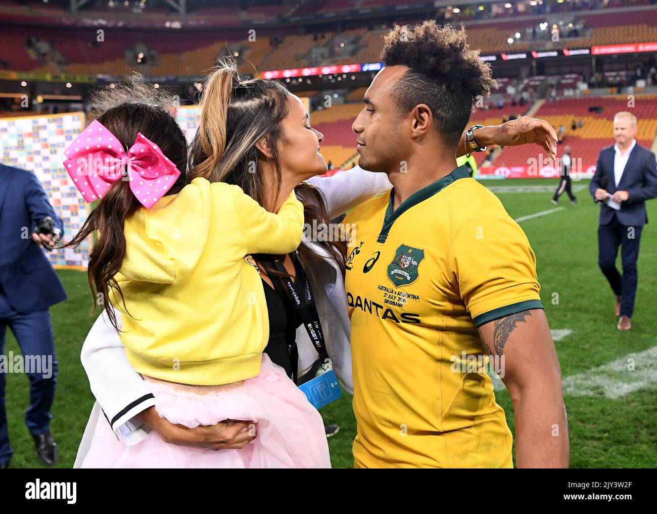 Will Genia of the Wallabies hugs his wife Vanessa and daughter Olivia ...