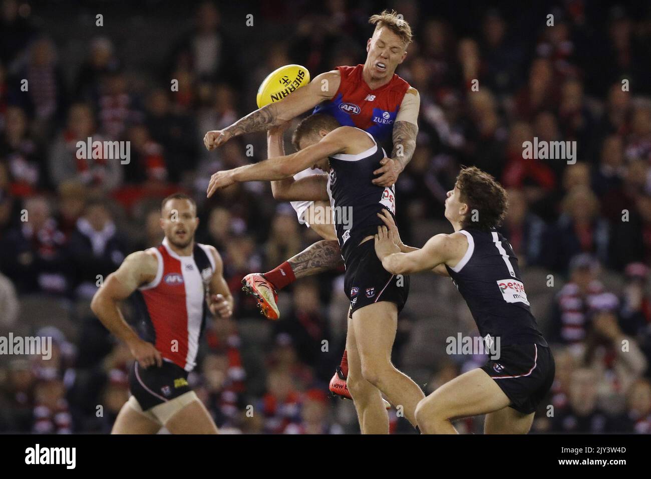 James Harmes of the Demons spoils the ball during the Round 19 AFL ...
