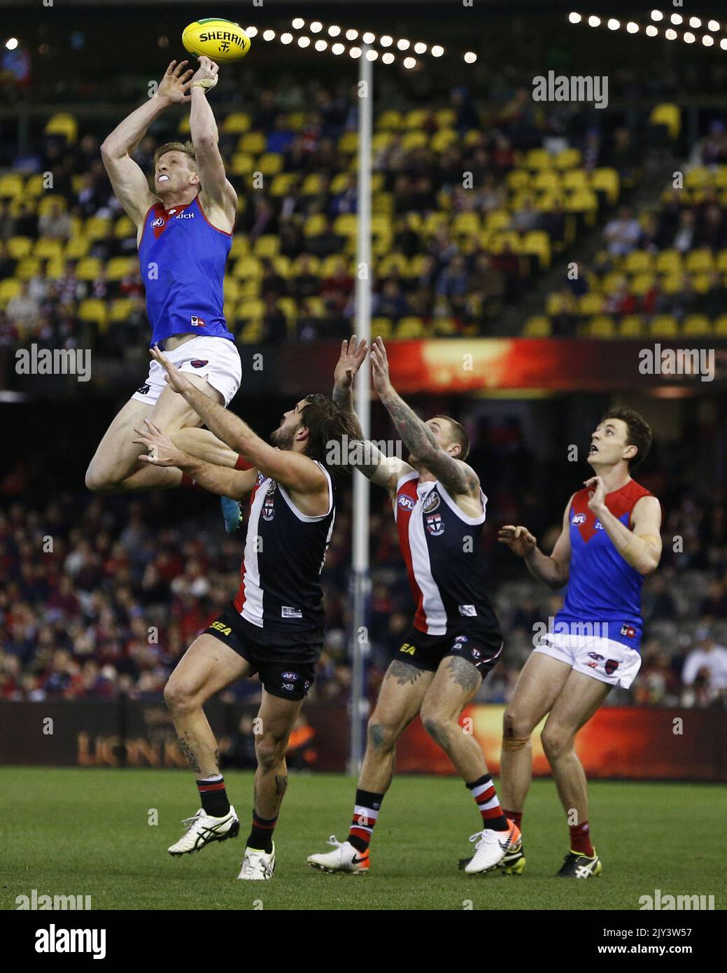 Sam Frost of the Demons attempts to take a high mark during the Round ...