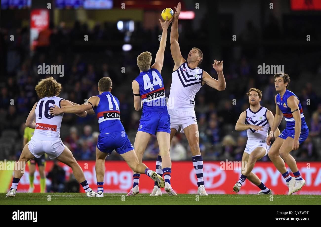 Tim English of the Bulldogs (third from left) and Aaron Sandilands of ...